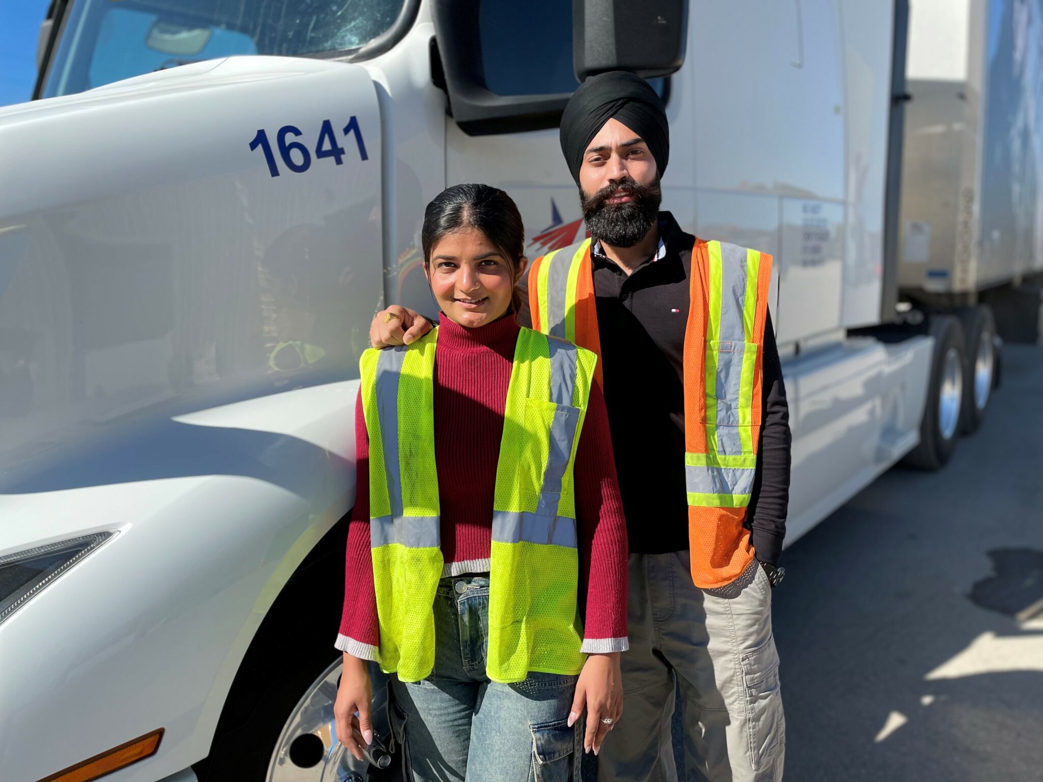 Young trucker couple embraces flatbed trucking, balanced lifestyle